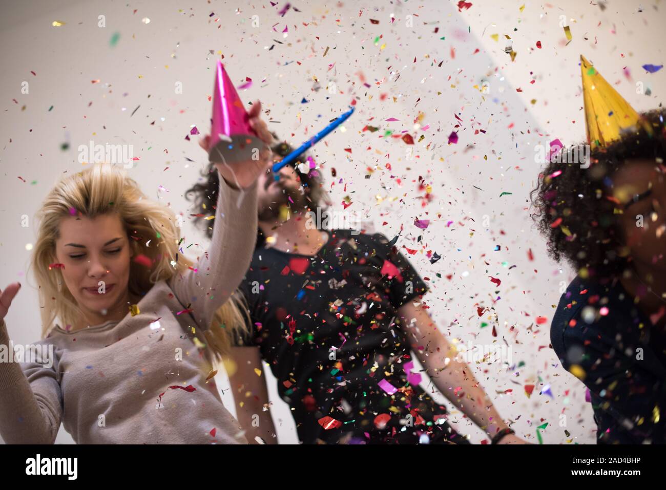 confetti party multiethnic group of people Stock Photo - Alamy