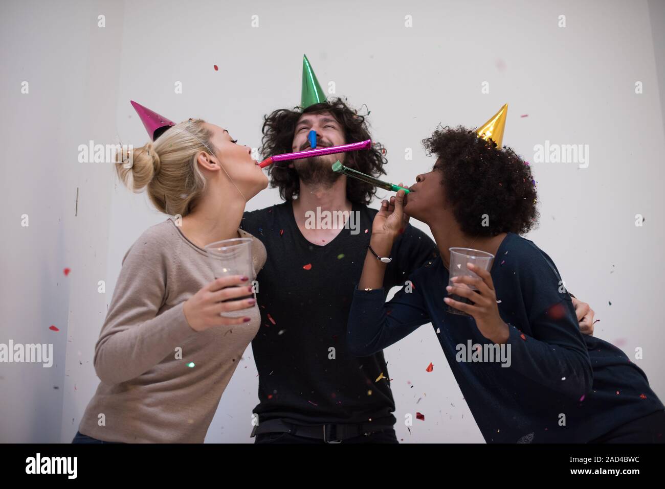 confetti party multiethnic group of people Stock Photo - Alamy