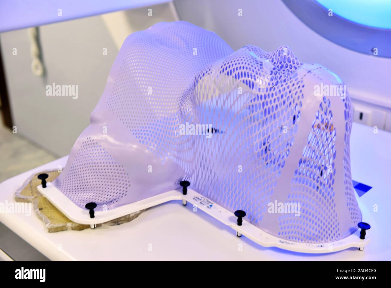 Radiotherapy mask. This rigid mask is custom-made for each patient and ...