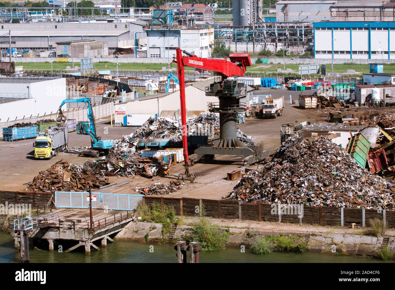 Scrap metal facility. Lorry being loaded with scrap metal at a ...