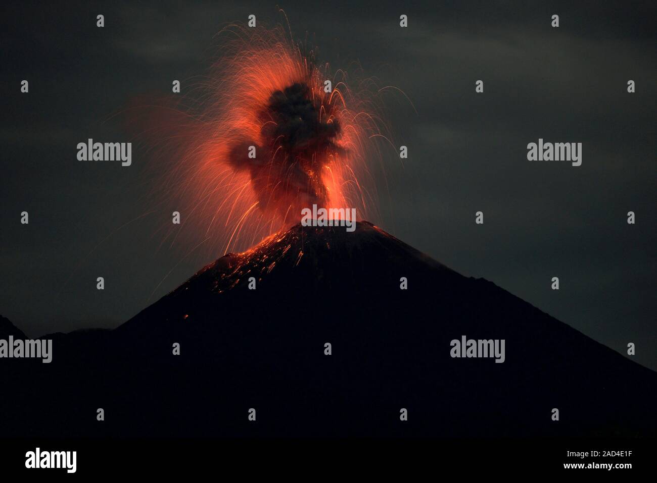 Reventador volcano erupting. View of the Reventador stratovolcano ...