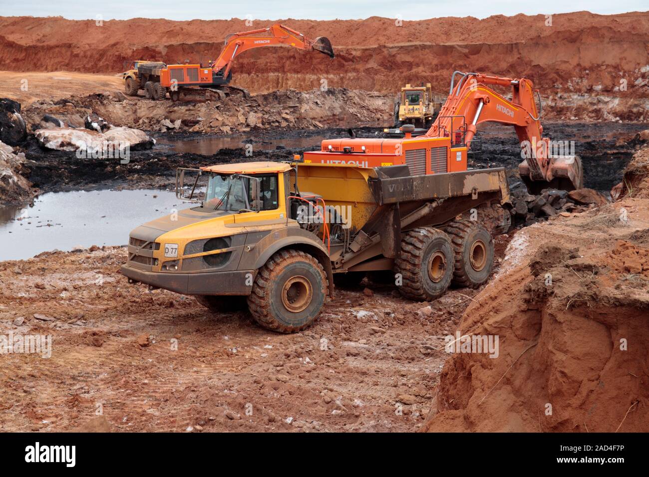 Open-cast coal mine. Diggers at an open-cast coal mine near Witbank ...