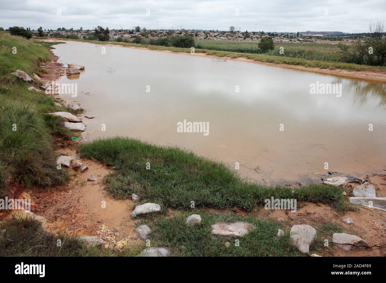 Abandoned acid mine drainage plant. Abandoned leaking tailing pond at ...