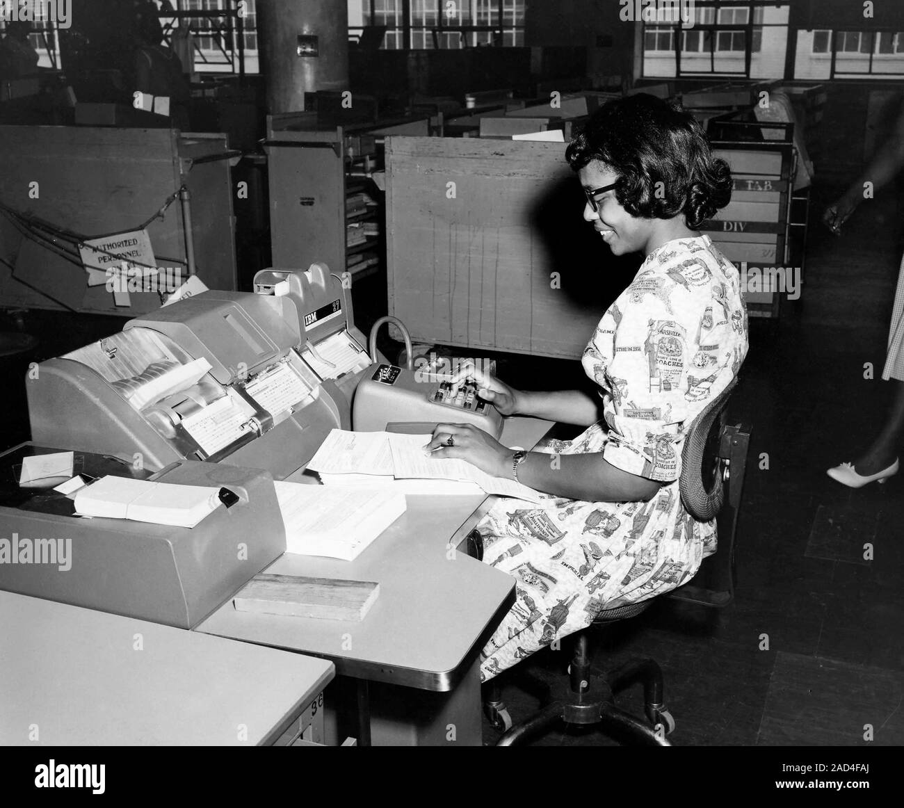 Punch cards for 1960 US Census. US Census Bureau employee using a card ...