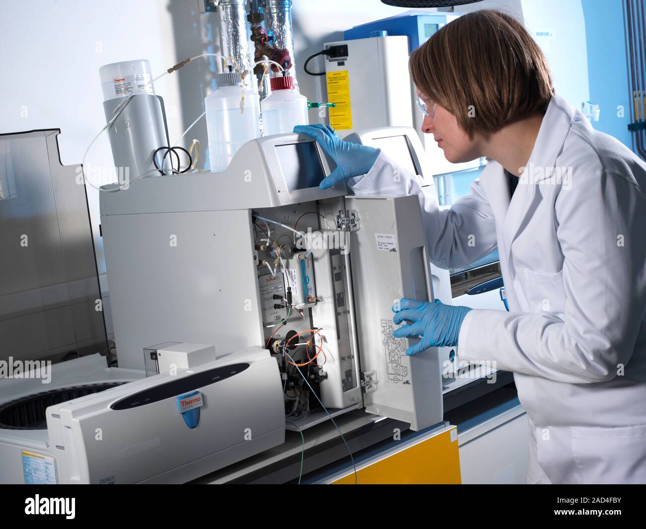Ion chromatography system. Researcher using an ion chromatography ...