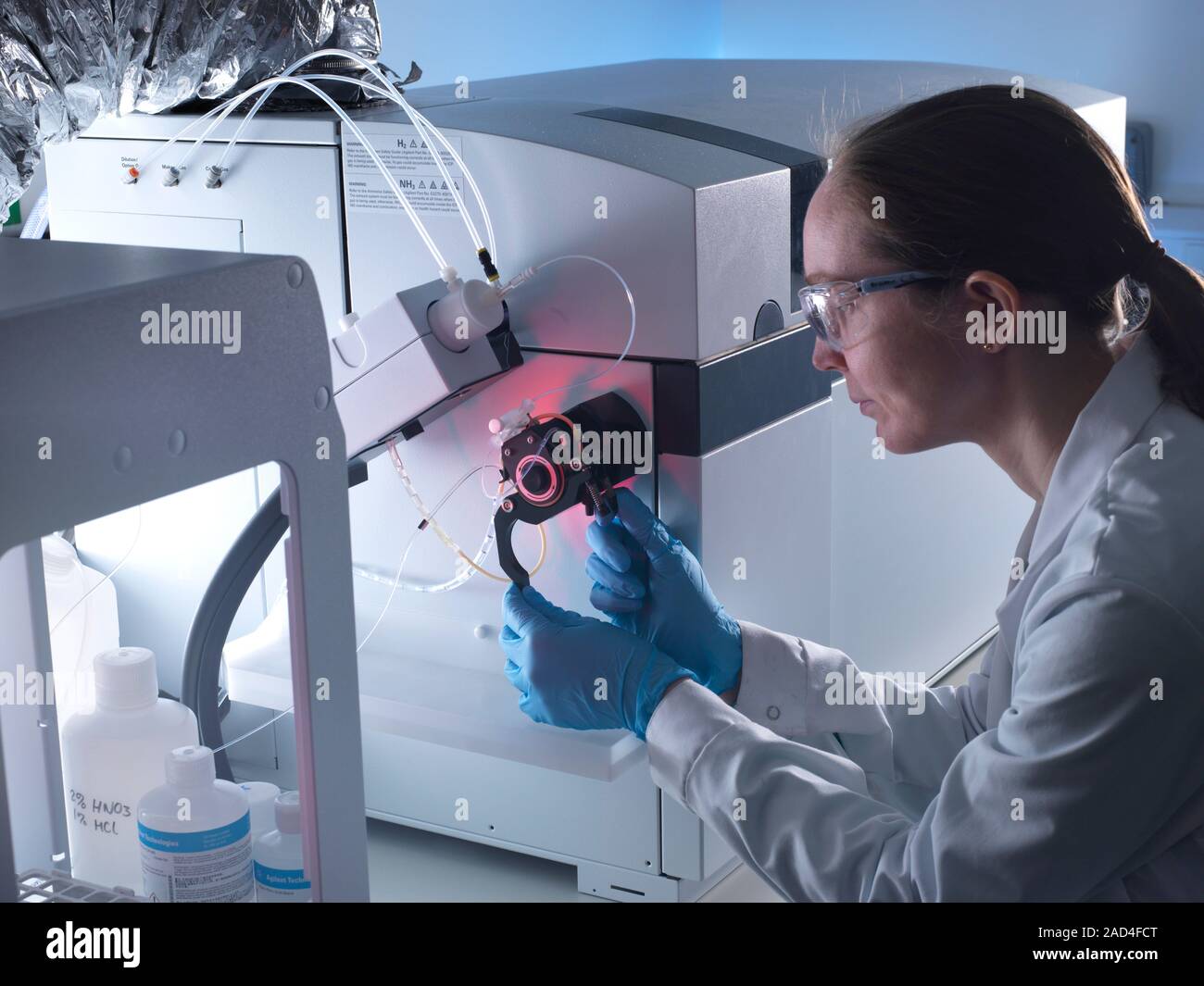 Triple quadrupole mass spectroscopy. Researcher using a triple ... Triple quadrupole mass spectroscopy. Researcher using a triple ...