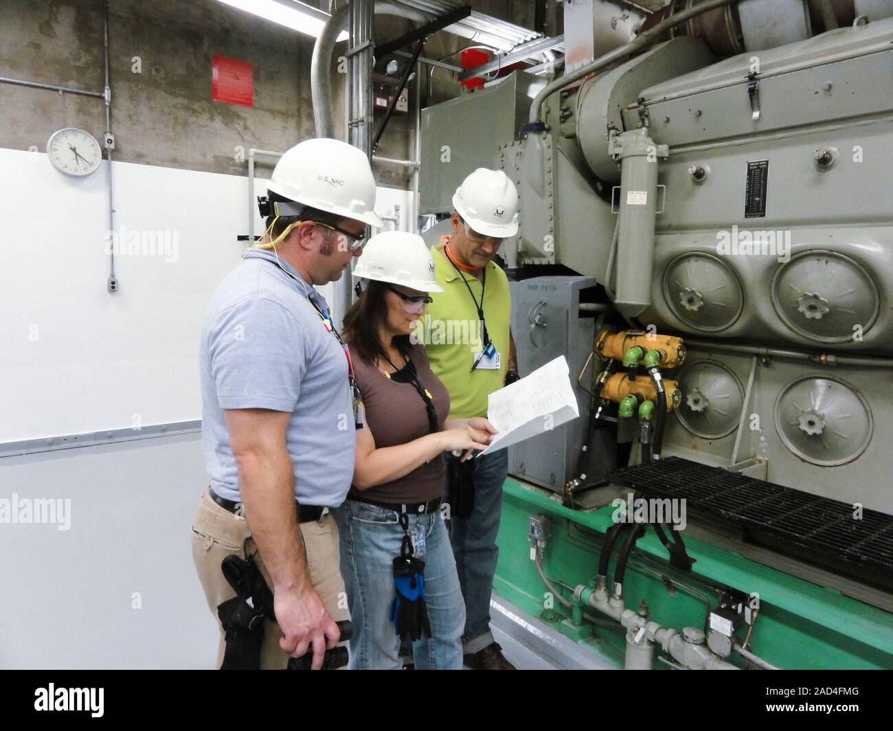 Nuclear Regulatory Commission inspectors carrying out an inspection of ...