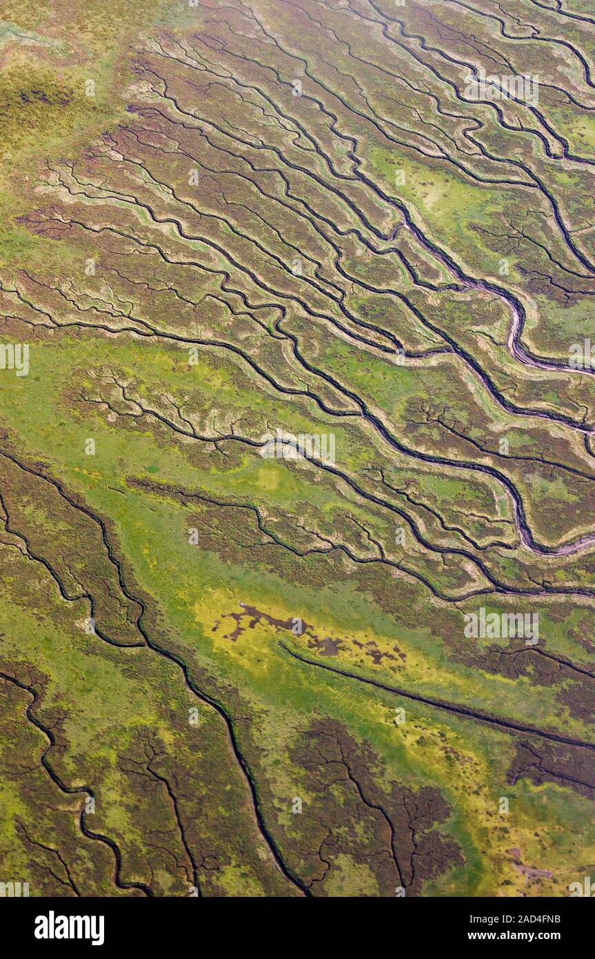 An aerial view of the River Dee salt marshes on the Wirral Peninsula ...