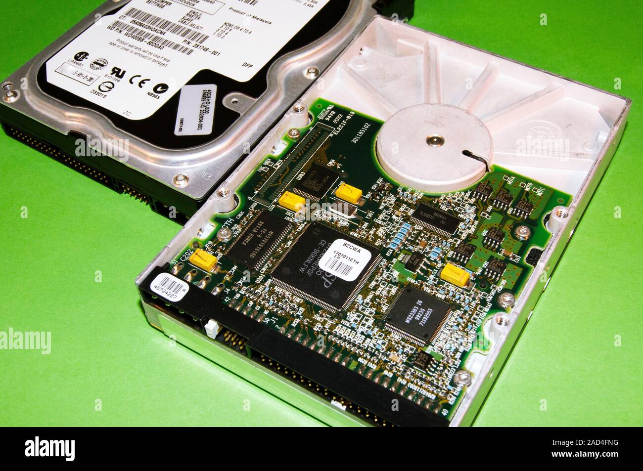Two hard disk drives from a desktop personal computer showing upper and ...