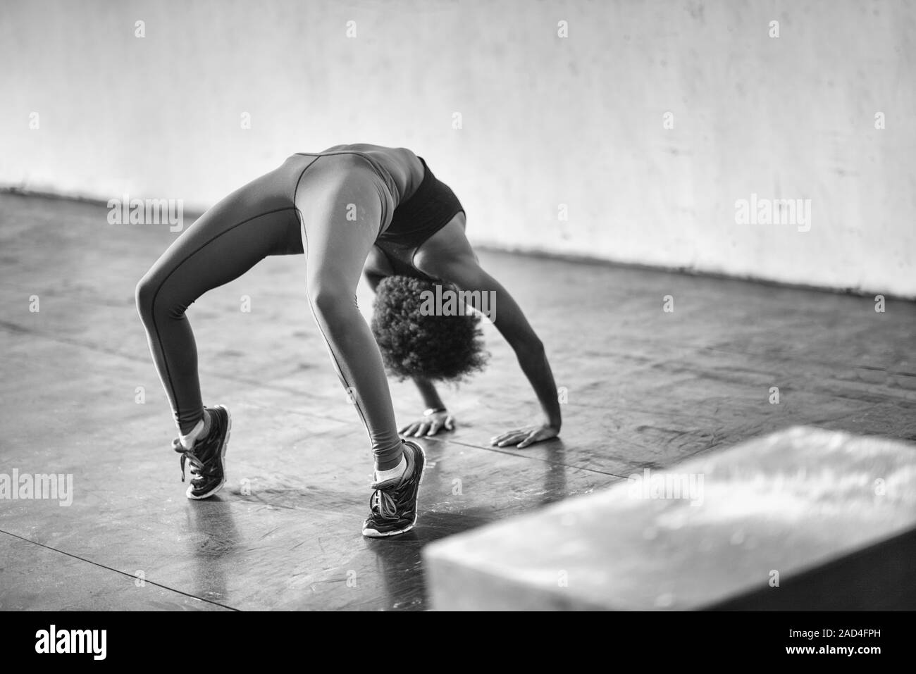 black woman standing in bridge pose Stock Photo - Alamy