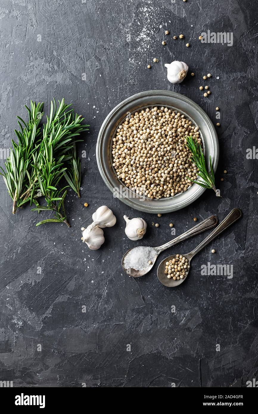 Rosemary, garlic, salt and white pepper, culinary background with ...