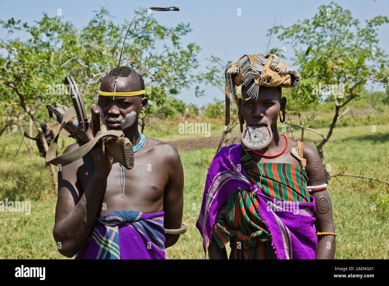 Mursi tribe couple the woman has a clay lip disc as body ornamentstribe ...