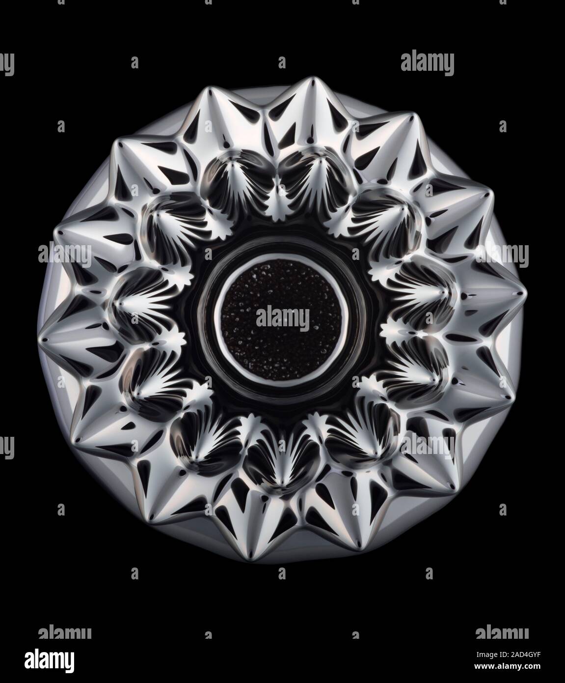 Ferrofluid in the magnetic field produced by a magnet. The peaks formed ...