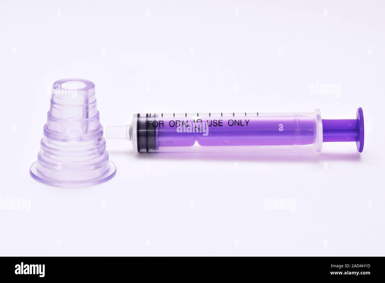 Oral syringe. Syringe used to administer liquid oral medication. The ...