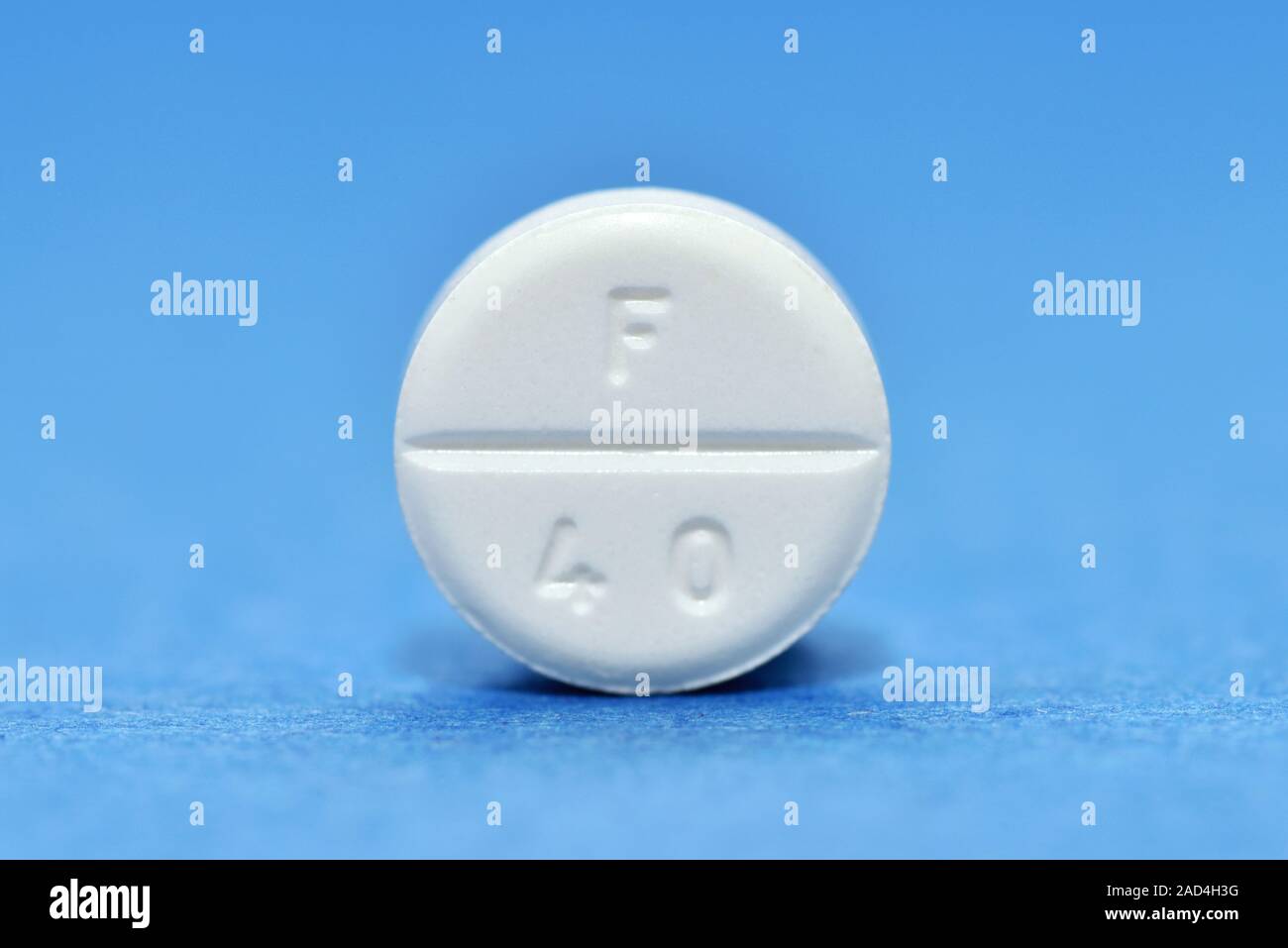 Furosemide oedema drug. Tablet of the drug furosemide, used to treat ...