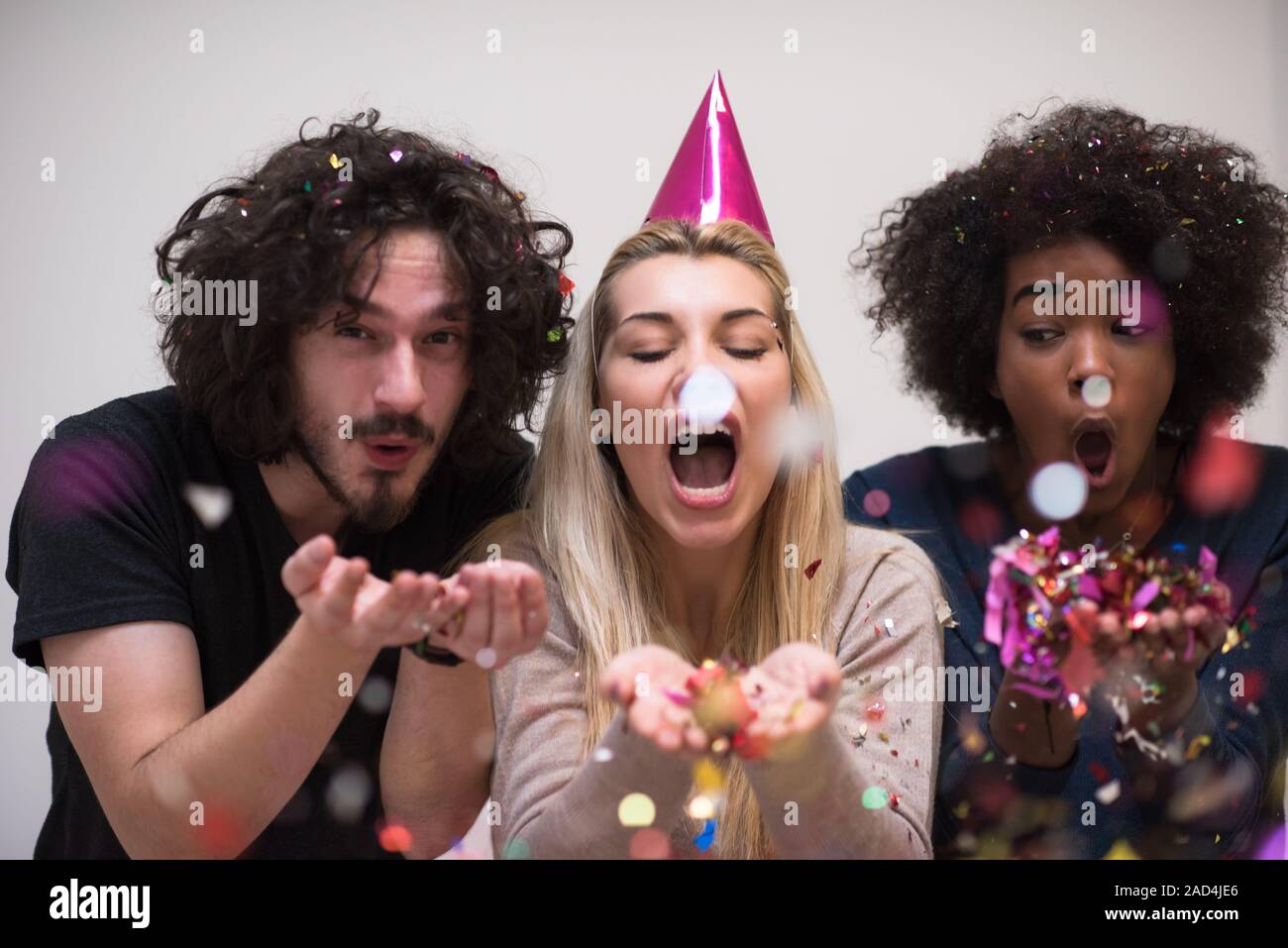 confetti party multiethnic group of people Stock Photo - Alamy