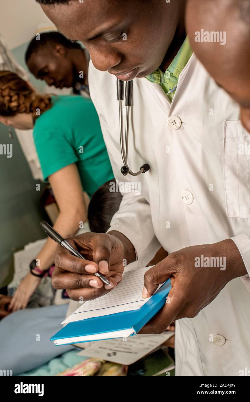 Hospital doctors taking notes. Photographed in St Mary's Hospital ...