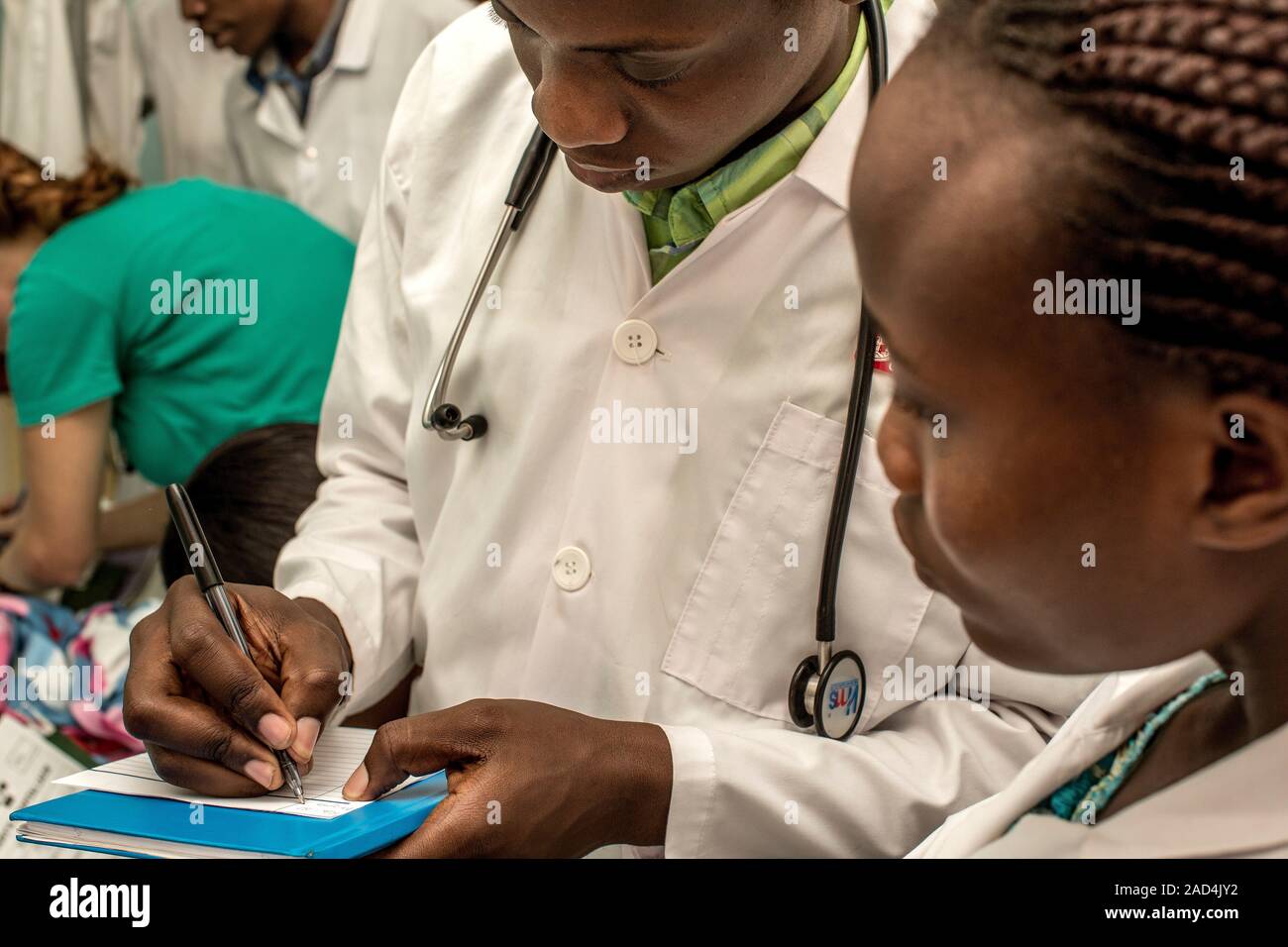 Hospital doctors taking notes. Photographed in St Mary's Hospital ...