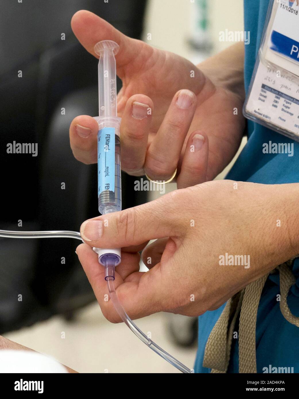 General anaesthesia drug infusion. Anaesthesiologist administering ...