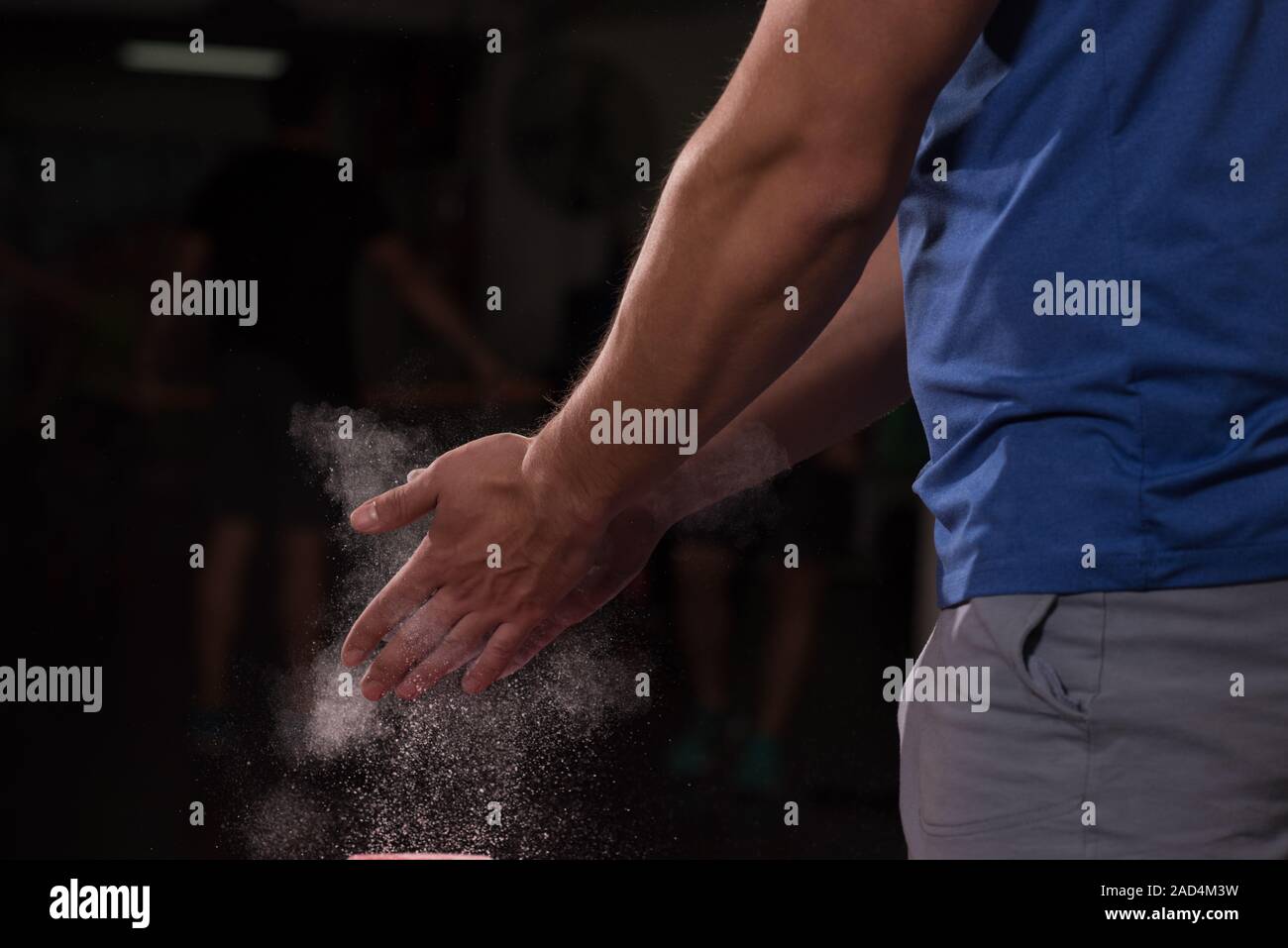 Gym Chalk Magnesium Carbonate hands clapping man Stock Photo - Alamy