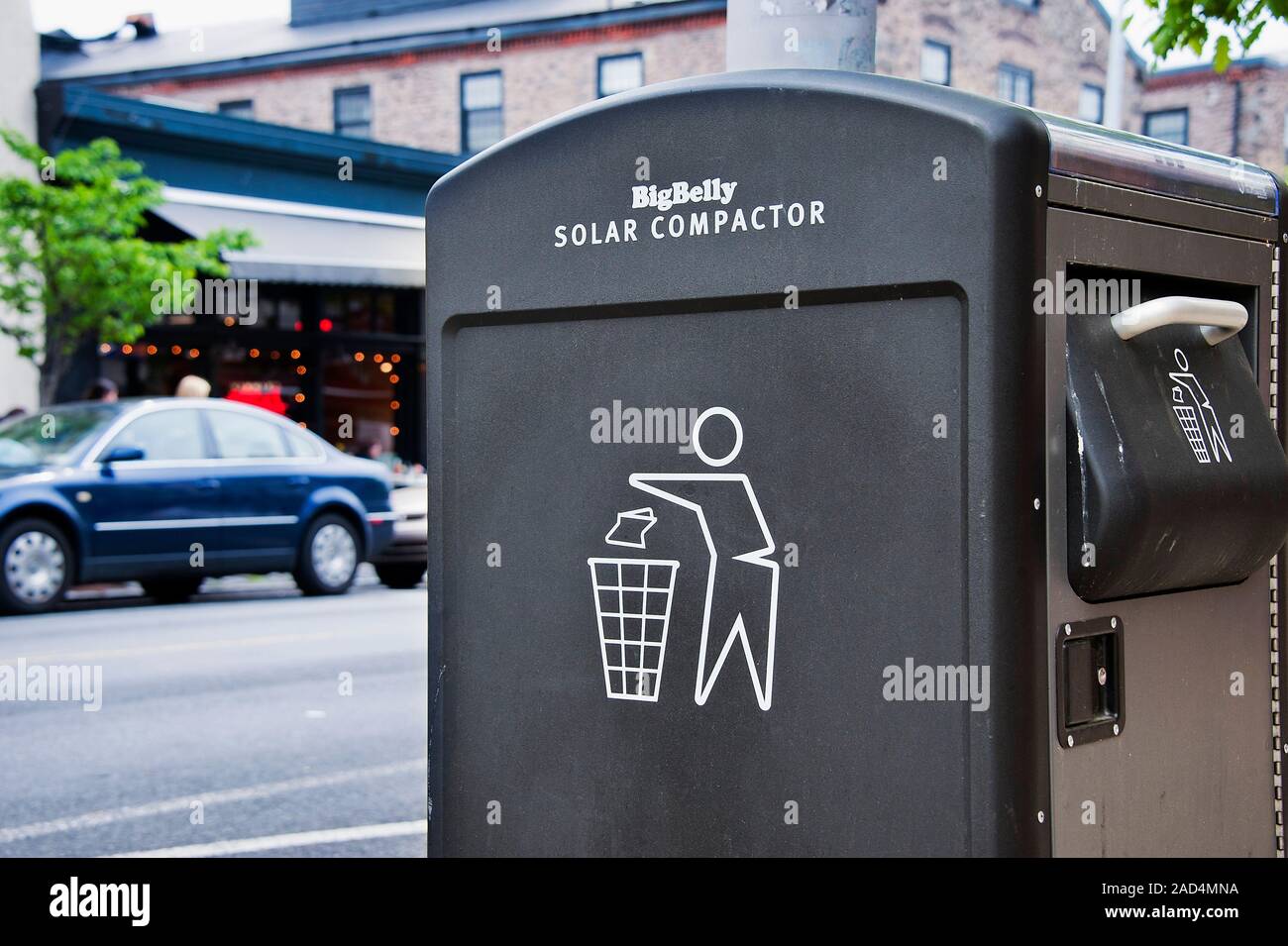 Compactor bin. Public solar-powered compactor litter bin. Photographed ...