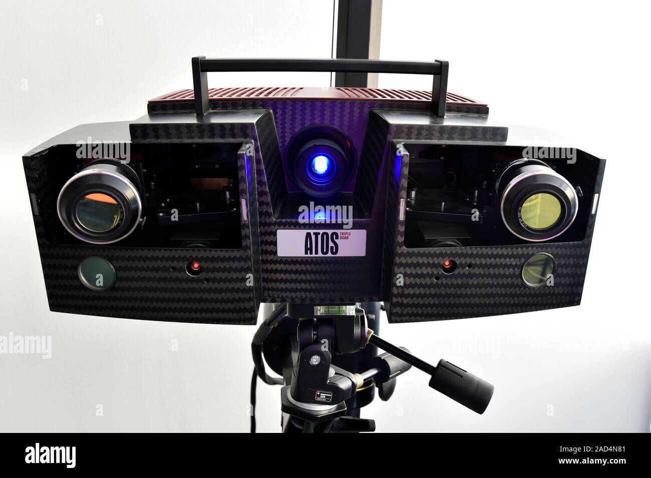 Forensic medicine scanner. ATOS 3D scanner and camera projecting a ...