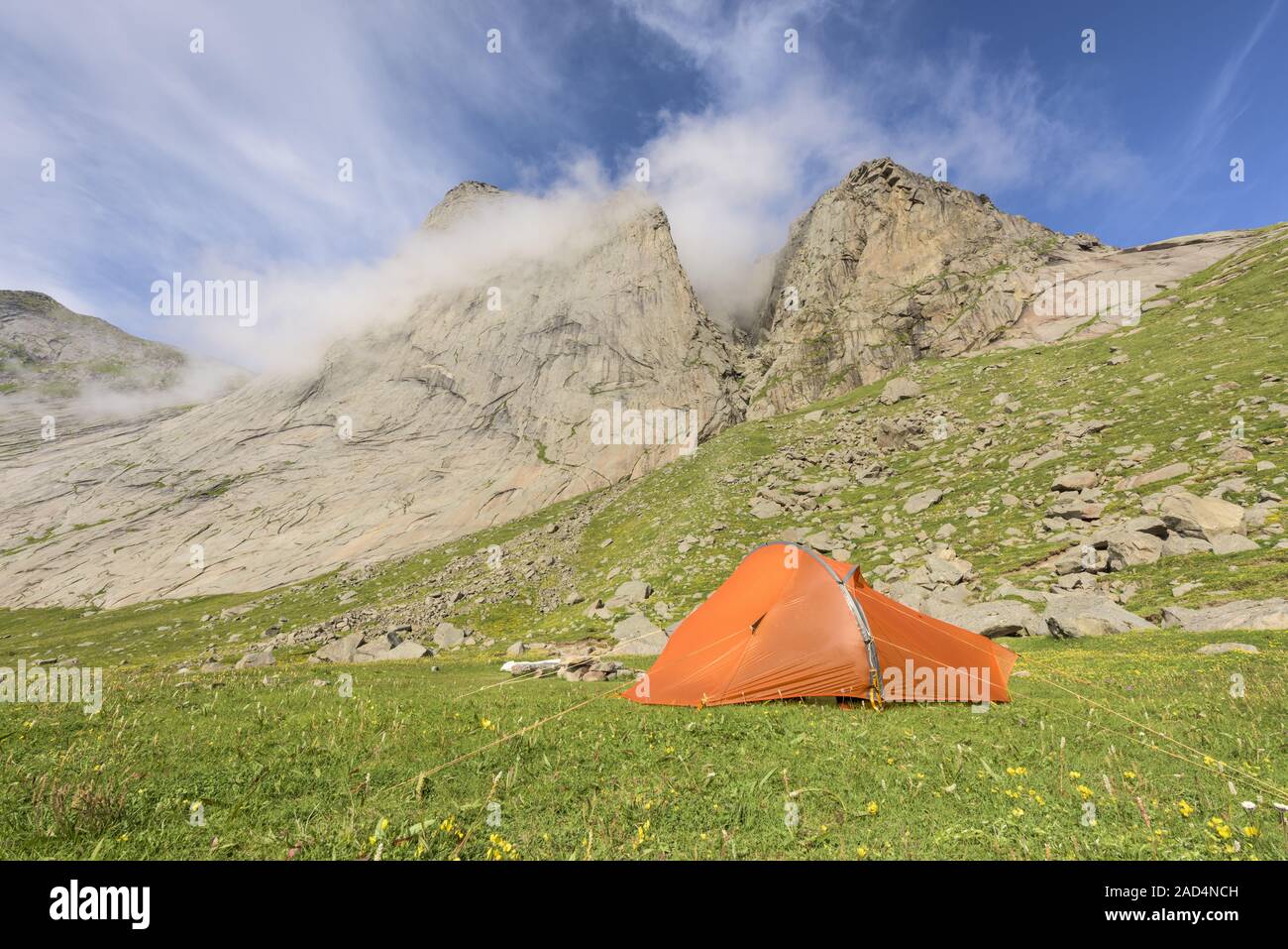 Tent beside a cliff wall, Buneset, Moskenesoeya, Lofoten, Norway Stock ...