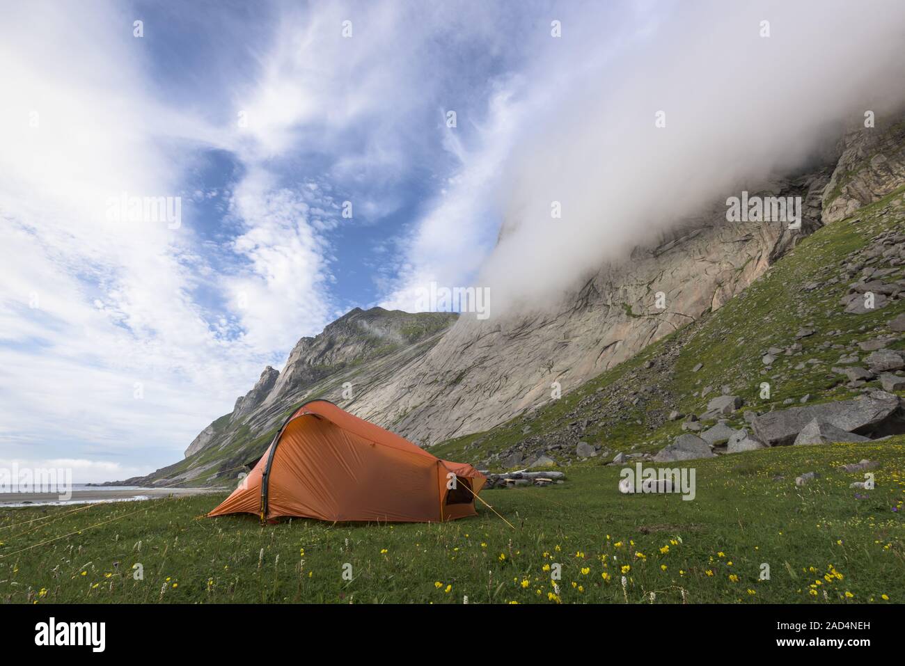 Tent beside a cliff wall, Buneset, Moskenesoeya, Lofoten, Norway Stock ...