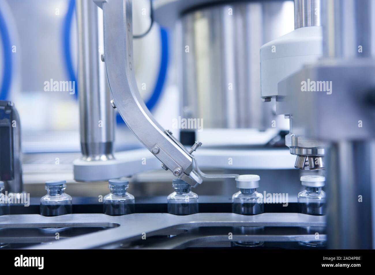 Drug manufacturing. Close-up of drug handling equipment inside a ...