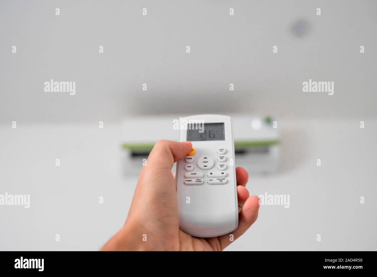 Man's hand using remote controler. Hand holding rc and adjusting ...