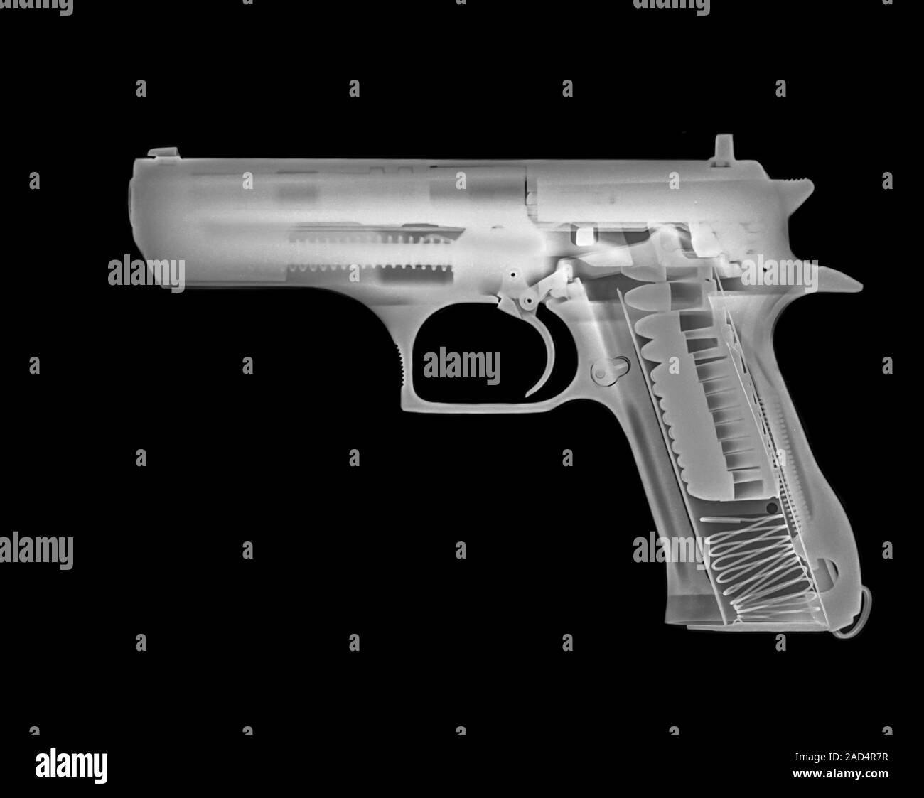 Handgun under x-ray Stock Photo - Alamy