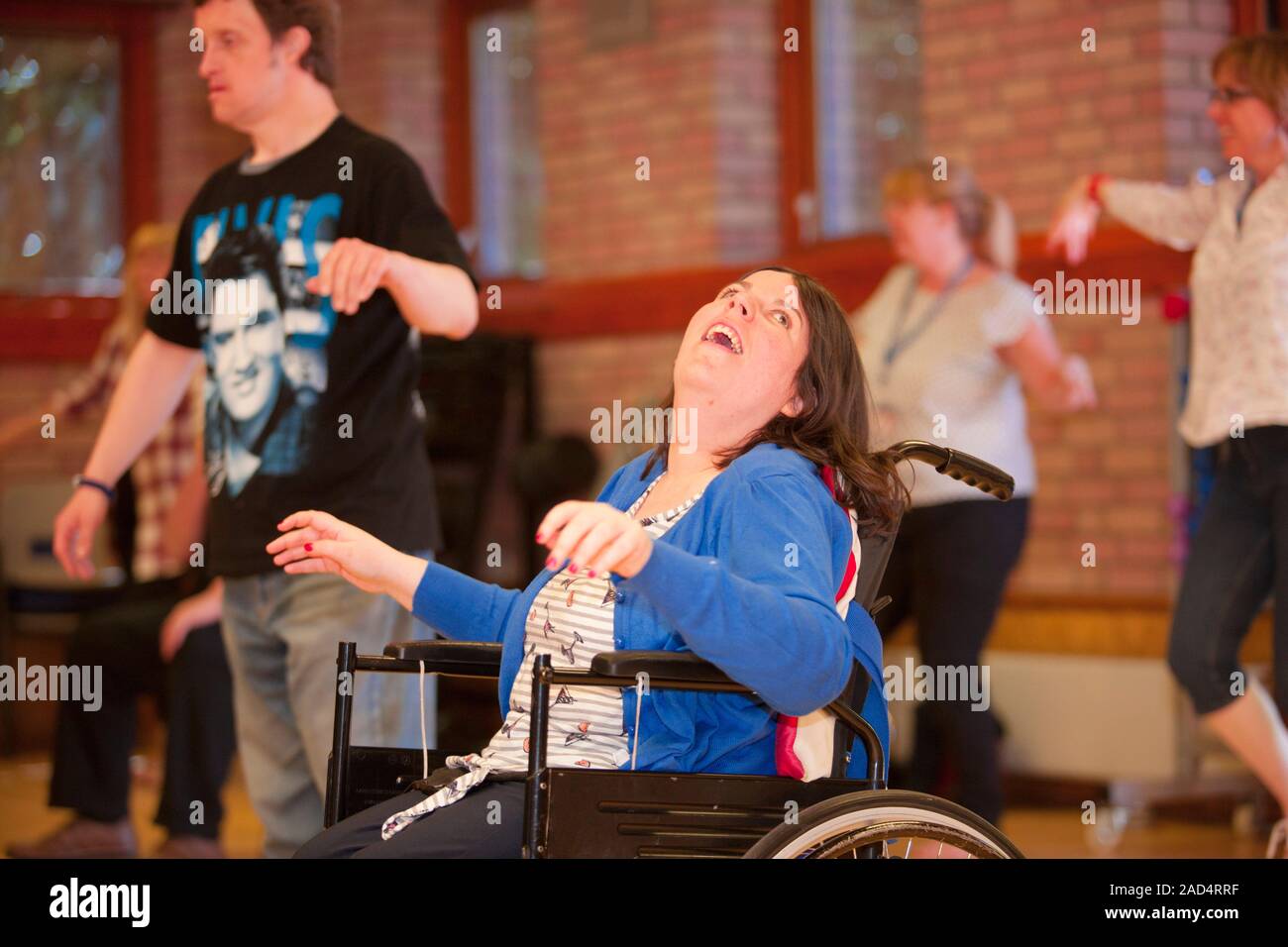 Exercise class for disabled people. Group of people with physical and ...