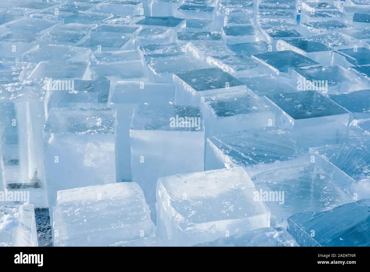 ice square blocks in the winter background. The texture of the ice in ...