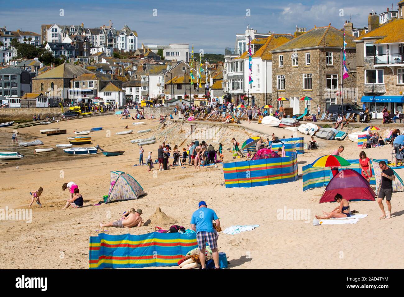 Holiday makers on the beach in St Ives, Cornwall, UK Stock Photo - Alamy