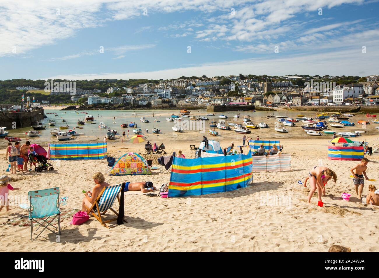 Holiday makers on the beach in St Ives, Cornwall, UK Stock Photo - Alamy