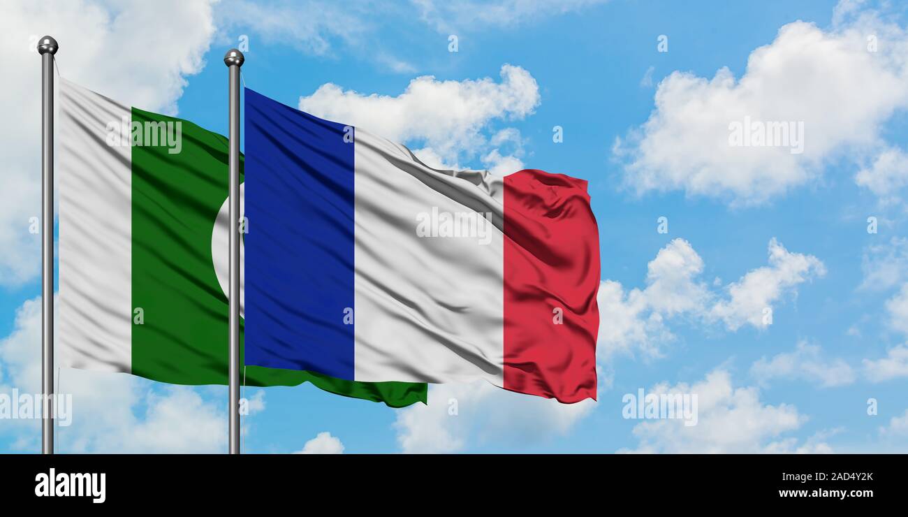 Pakistan and France flag waving in the wind against white cloudy blue ...