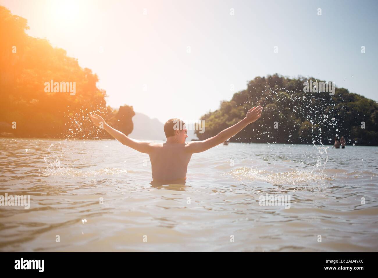 Muscular men in sea hi-res stock photography and images - Alamy