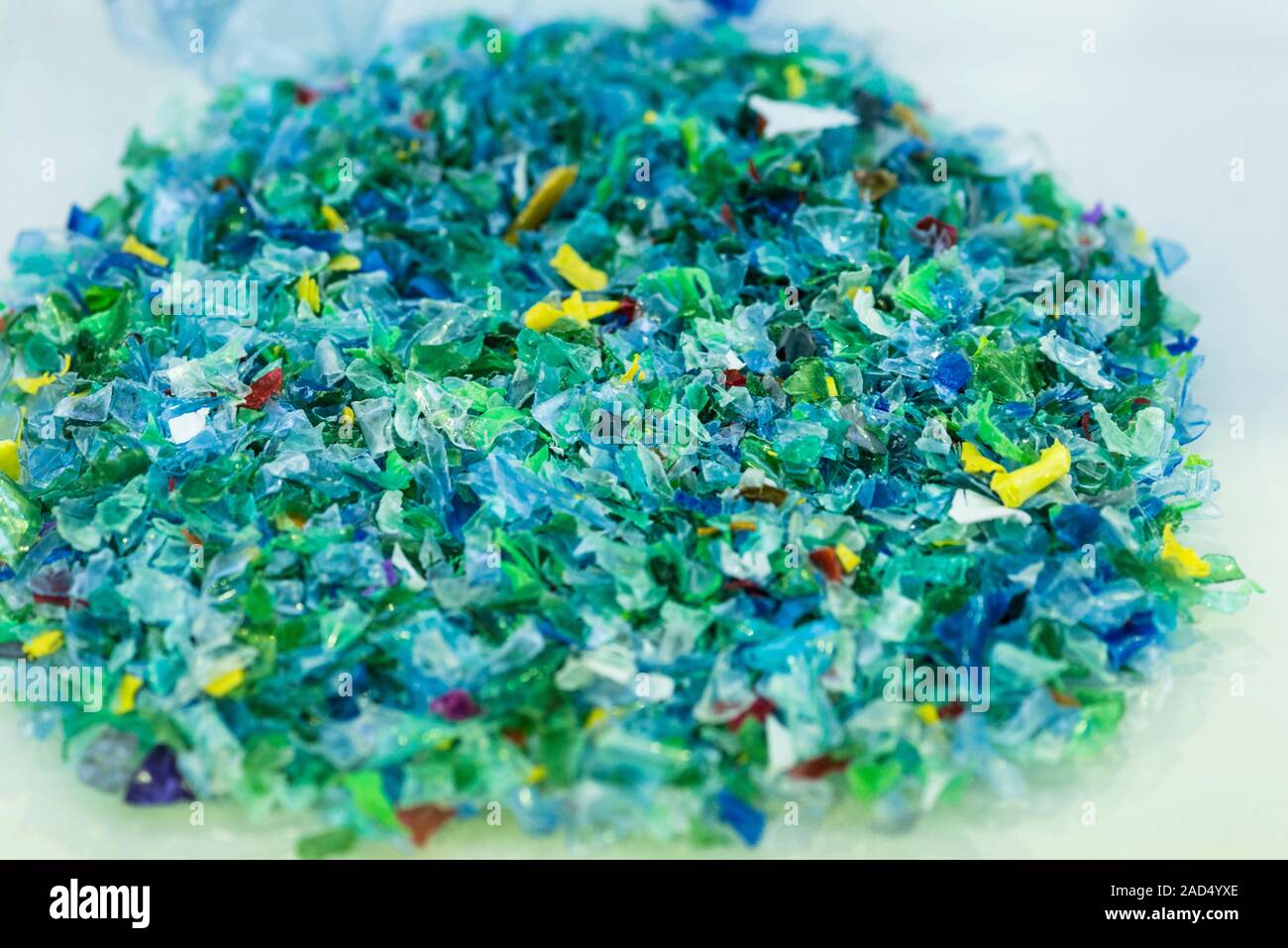 Plastic chips from recycled water bottles at a plastics recycling ...