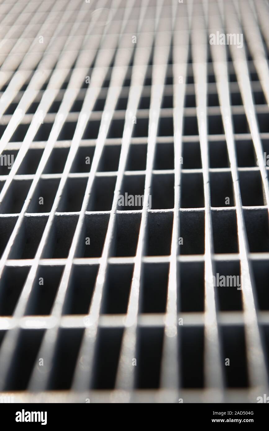 Metal lattice with small cells grid. Stock photo background with ...