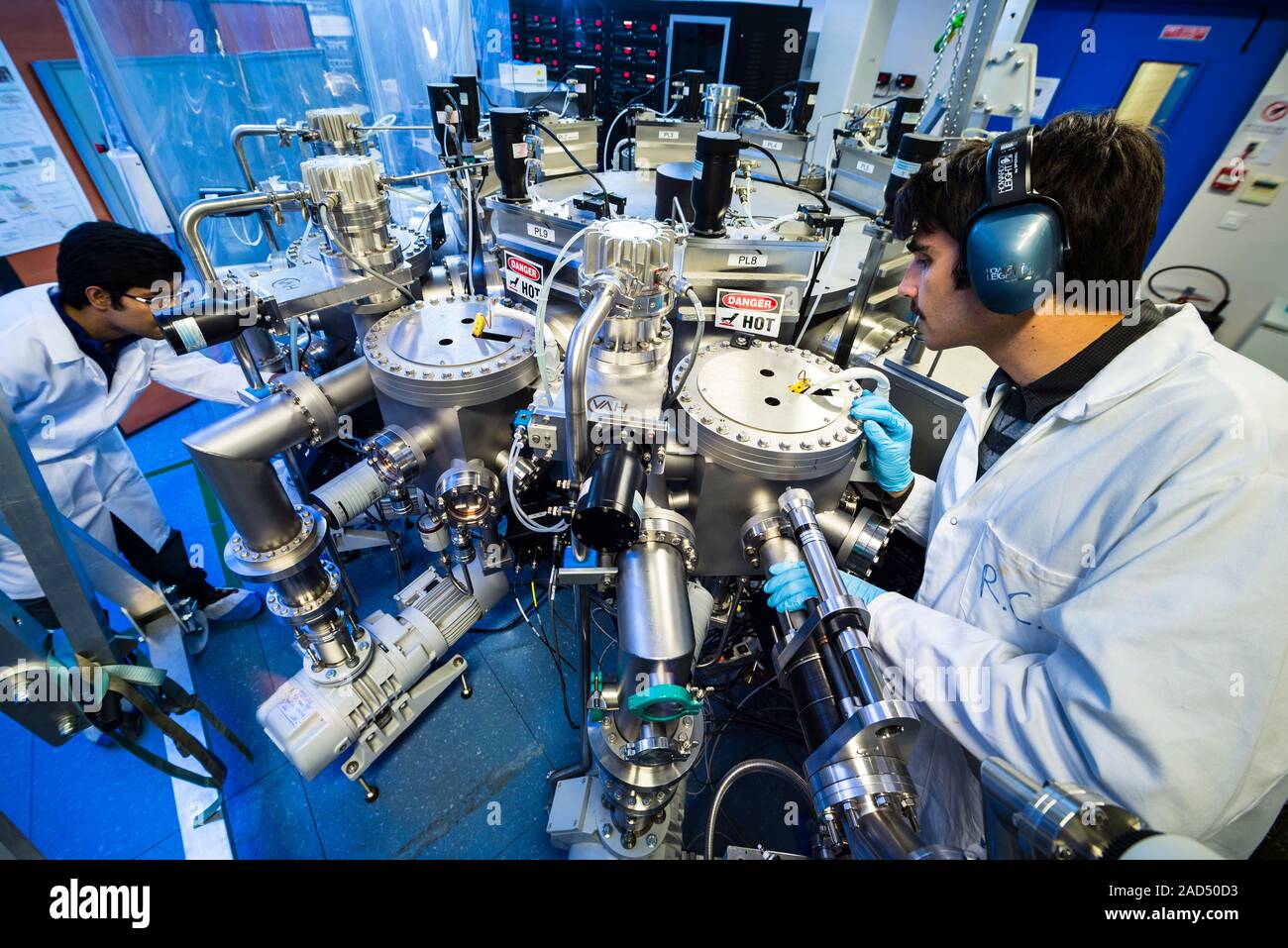 Thin-film photovoltaic cell research. Researchers monitoring thin-film ...