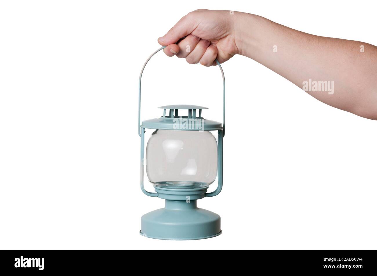 Man hand hold a candle lamp on white background Stock Photo - Alamy