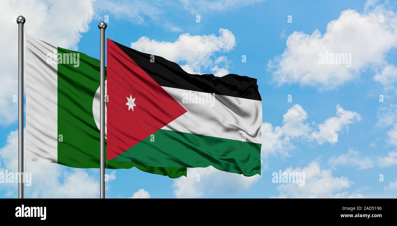 Pakistan and Jordan flag waving in the wind against white cloudy blue ...