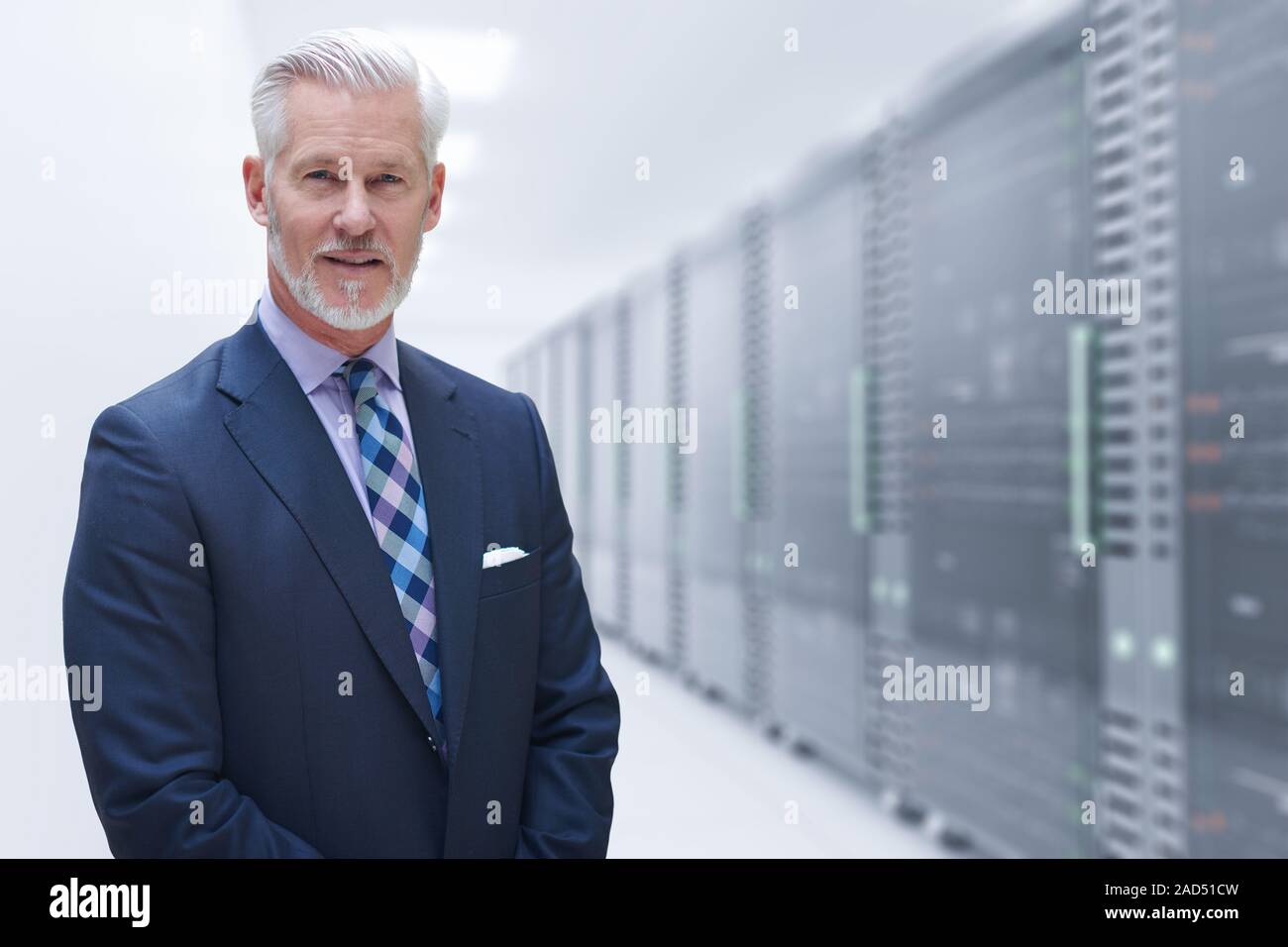 Senior Businessman in server room Stock Photo - Alamy