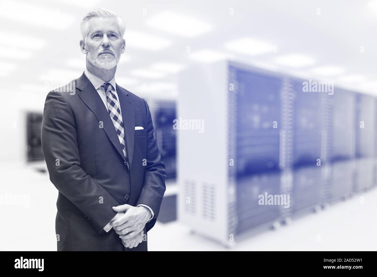 Senior Businessman in server room Stock Photo - Alamy