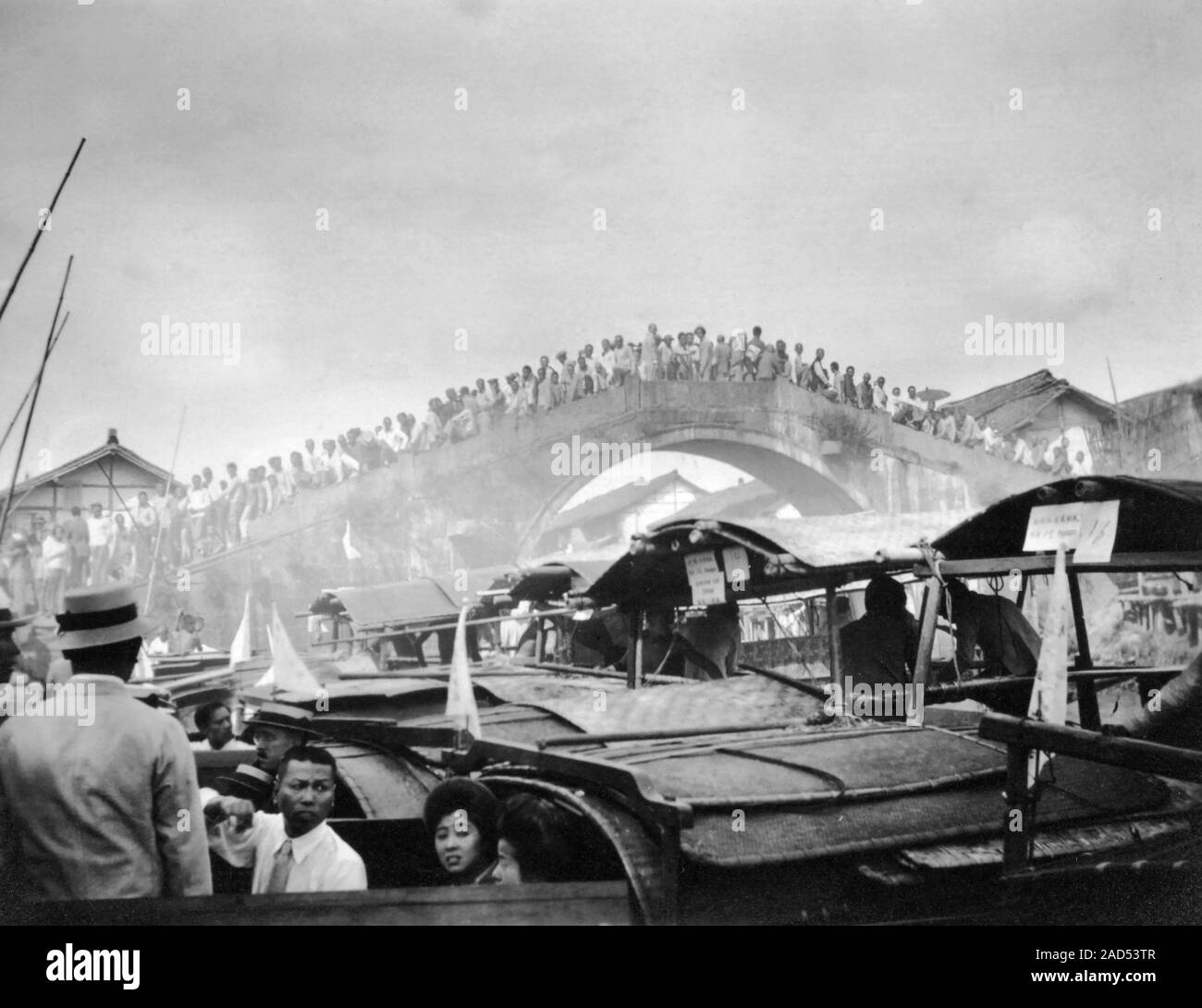 Bridge in China. Typical Chinese bridge and boats, as photographed by ...