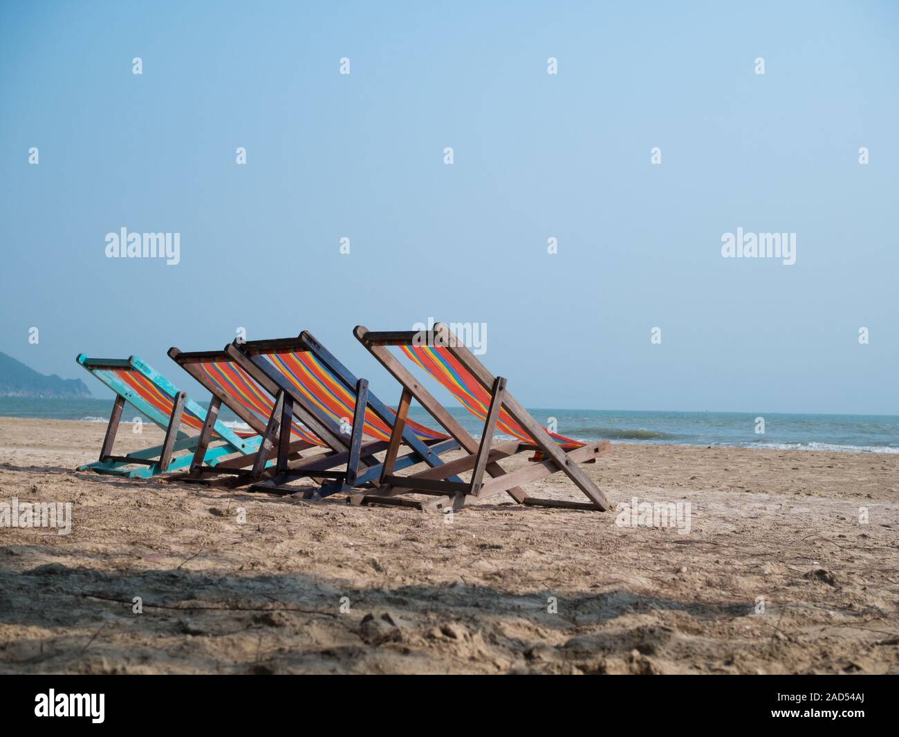 Deck chairs on beach hi-res stock photography and images - Alamy