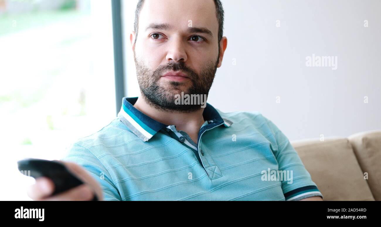 Happy Man Watching Television Stock Photo - Alamy