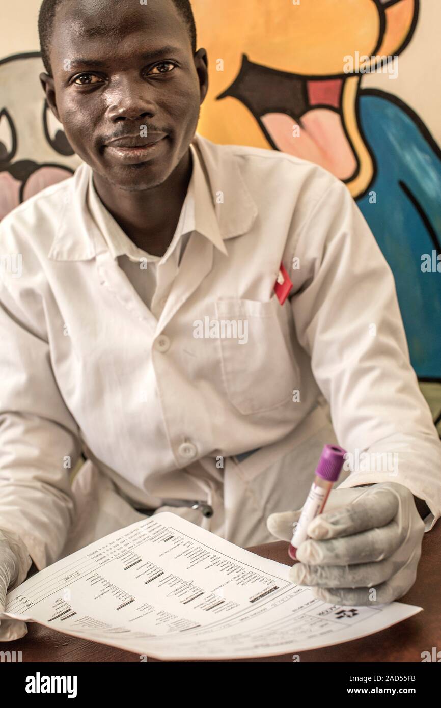 Hospital doctor handling a blood sample. Photographed in St Mary's ...