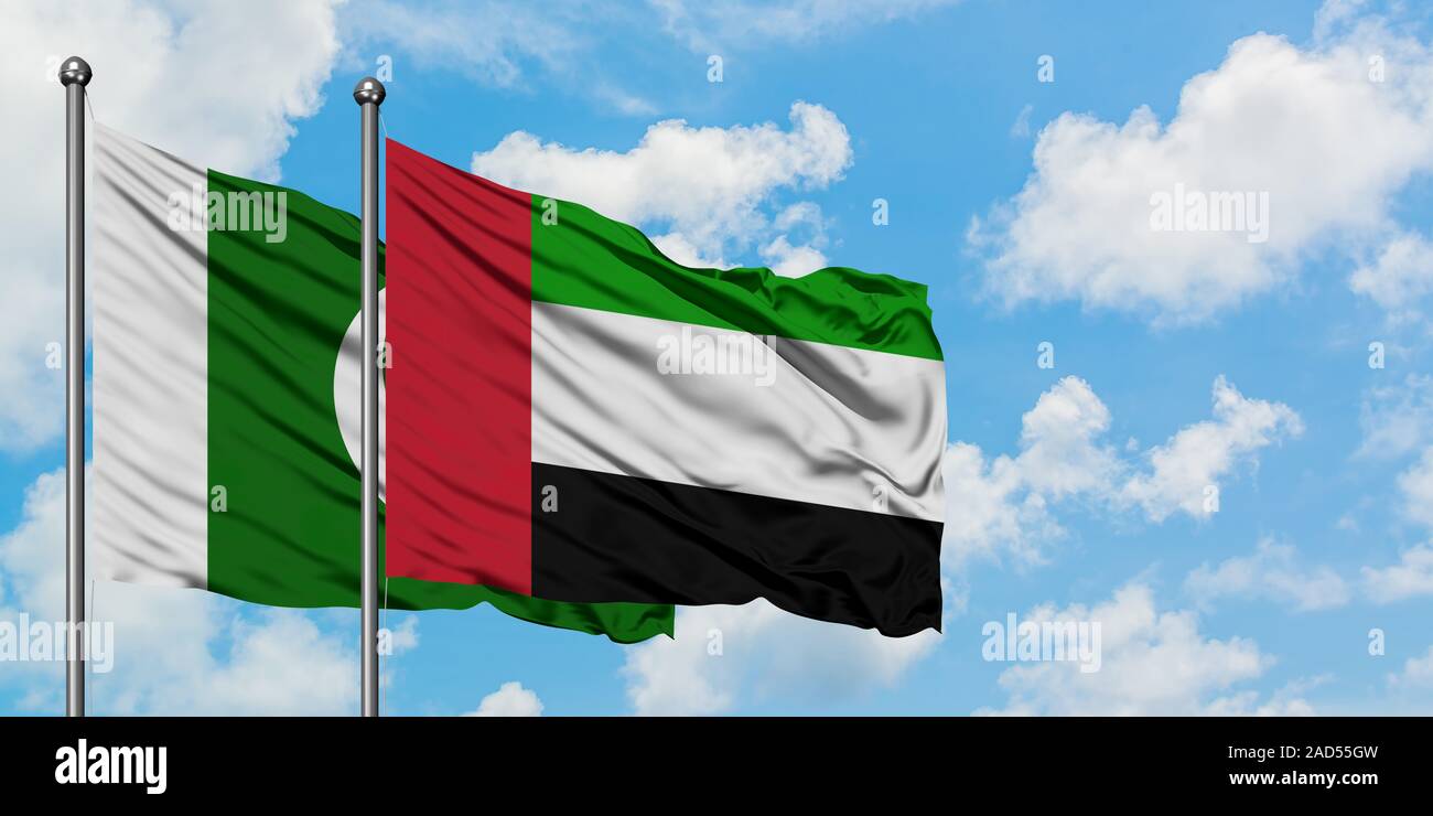 Pakistan and United Arab Emirates flag waving in the wind against white ...