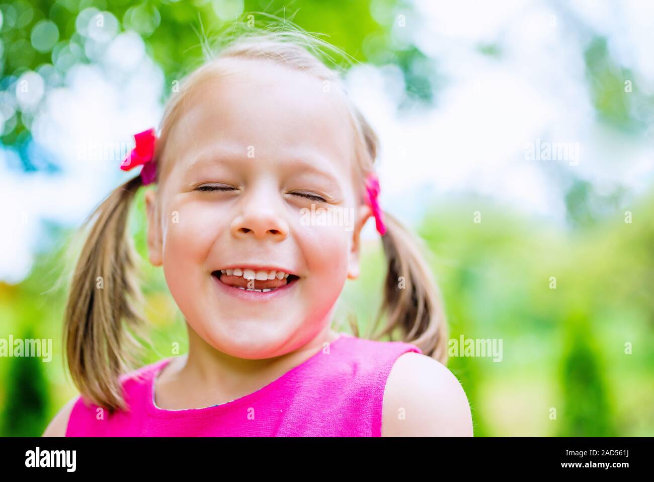 Summer portrait of happy cute child Stock Photo - Alamy